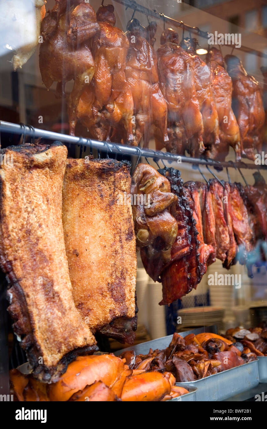 Duck and Pork in Chinese Restaurant window Stock Photo - Alamy