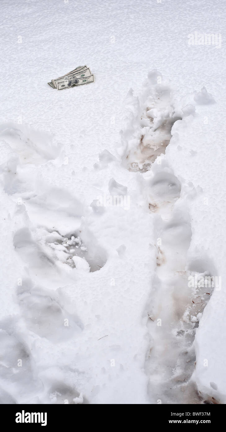 Follow the money concept where footprints in snow lead to one hundred ...