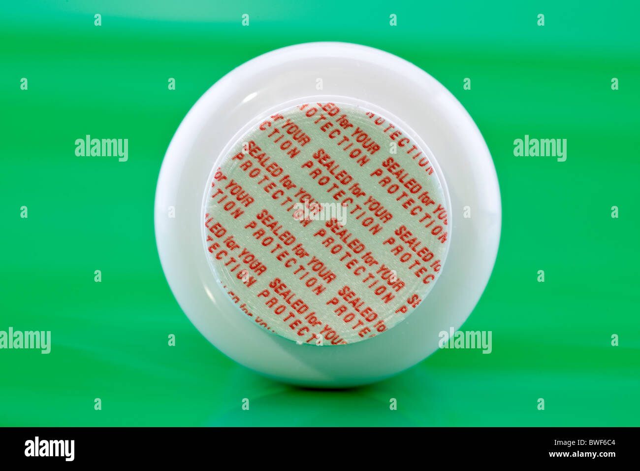 Protective seal on a plastic bottle Stock Photo - Alamy
