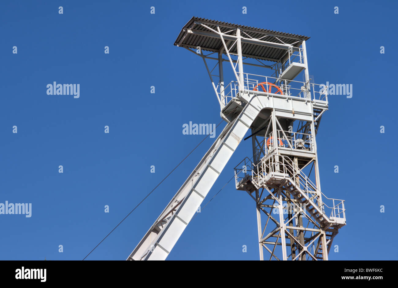 Vie of single tower mine against clear deep blue sky Stock Photo - Alamy