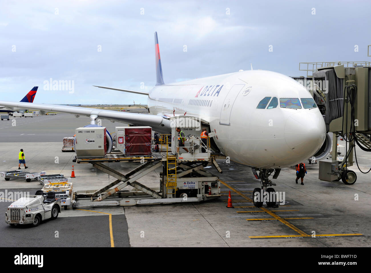 Jet airplane being loaded with food and supplies before flight Stock ...