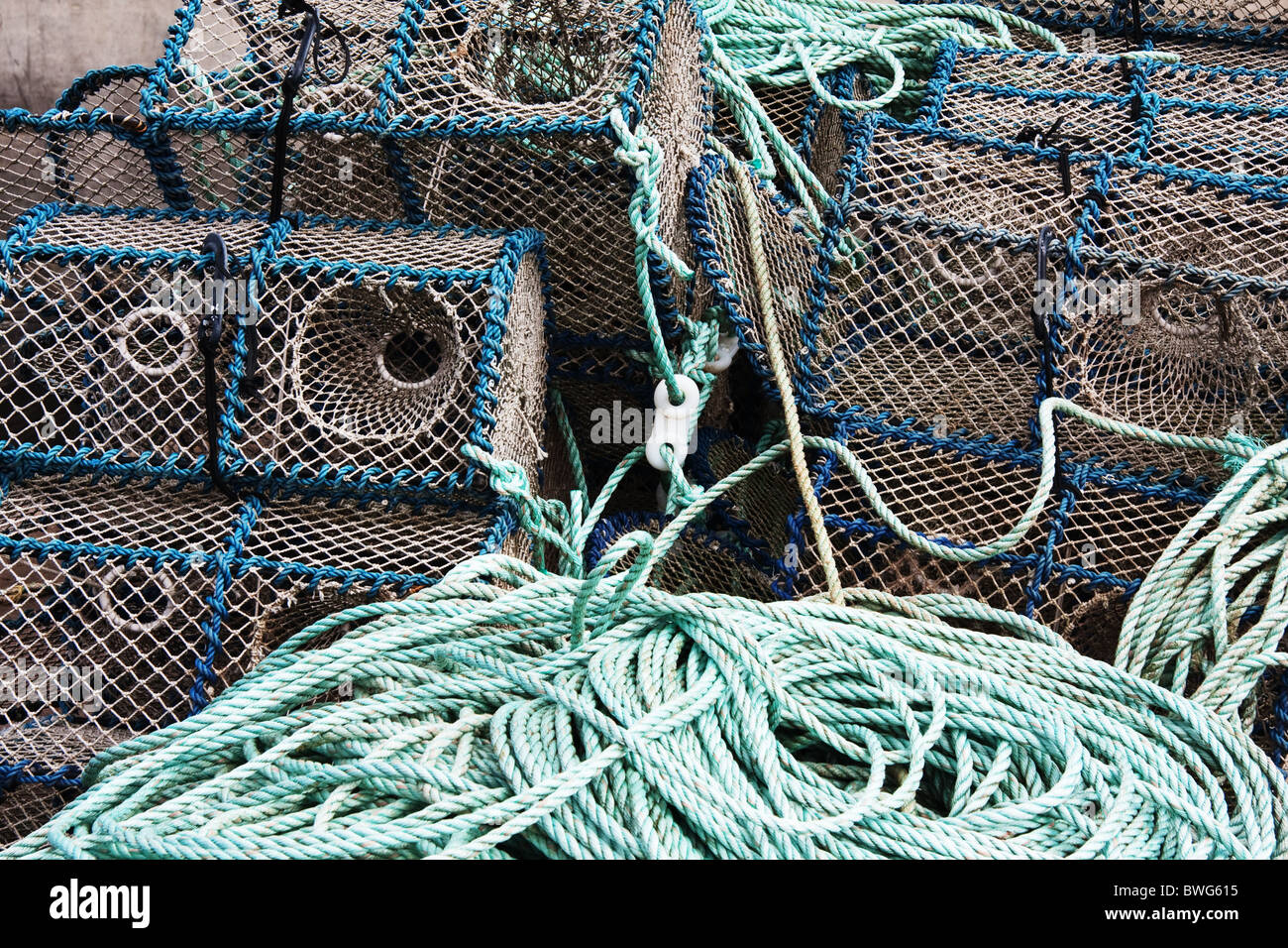 Lobster pots and green rope Stock Photo - Alamy