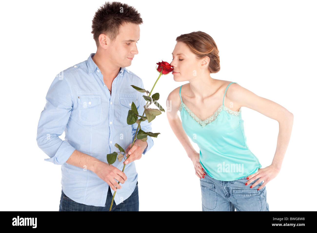 Young attractive couple in romantic mood isolated over white Stock ...