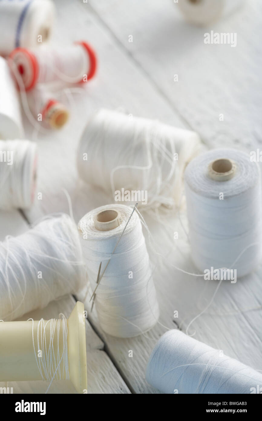 Collection of white cotton reels Stock Photo - Alamy