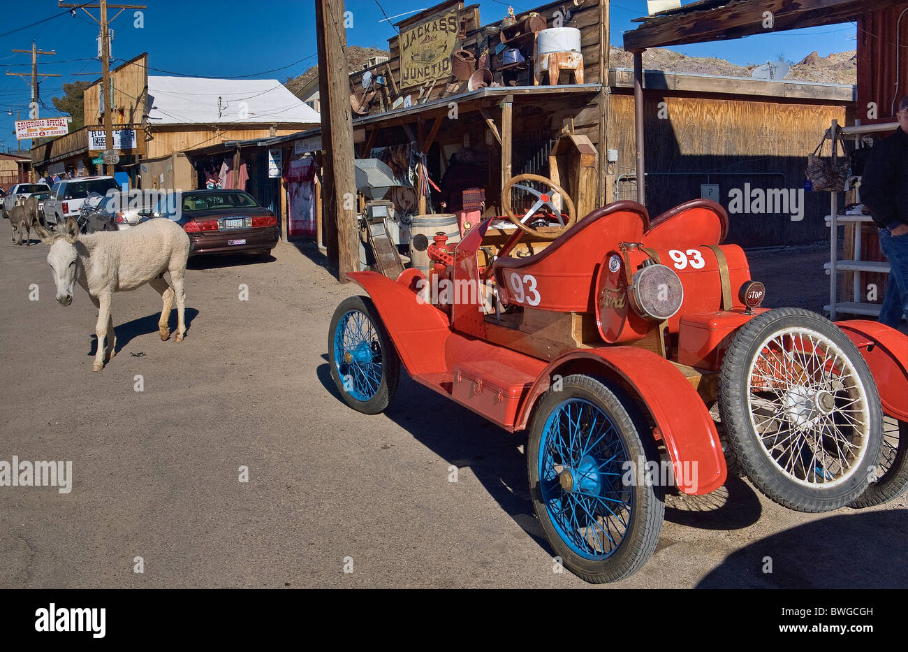 Burro, vintage car at street in Oatman, Route 66 in Black Mountains ...