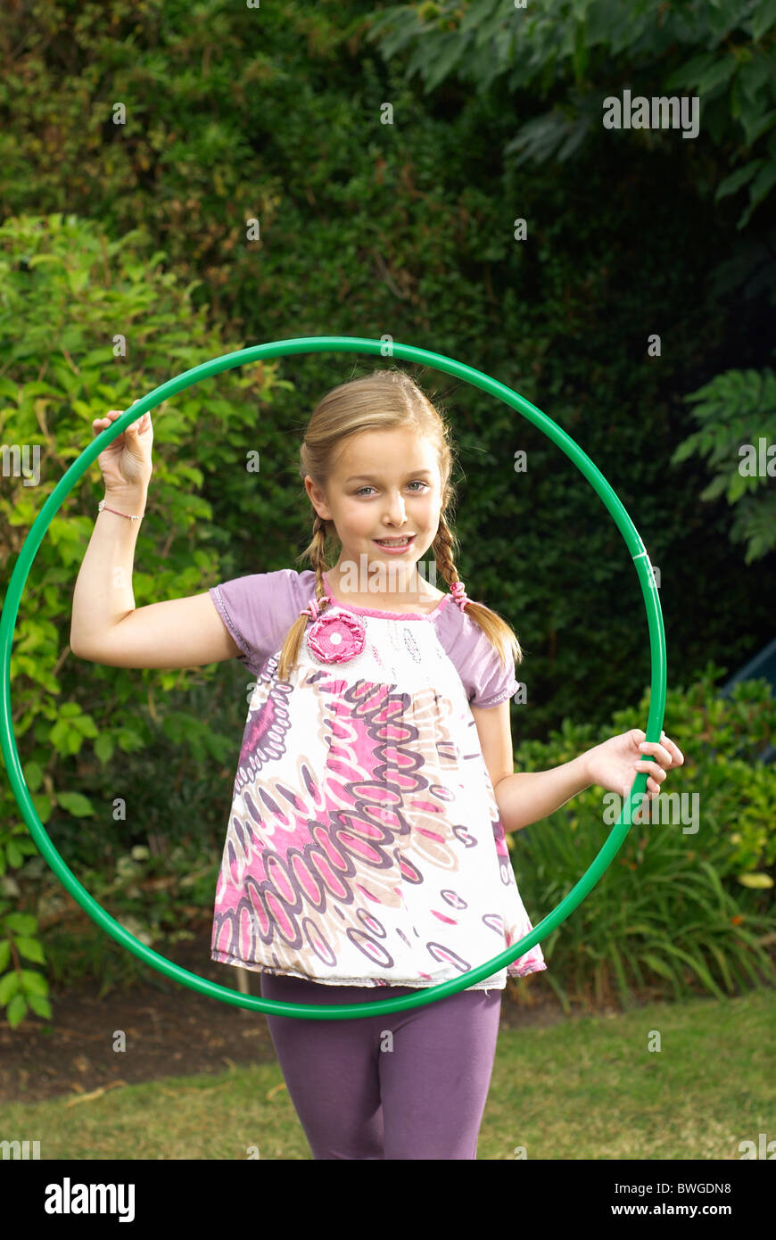 Young girl portrait in a hoop Stock Photo - Alamy