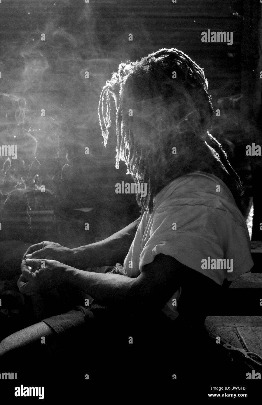 Rolling a cigarette Black and White Stock Photos & Images - Alamy