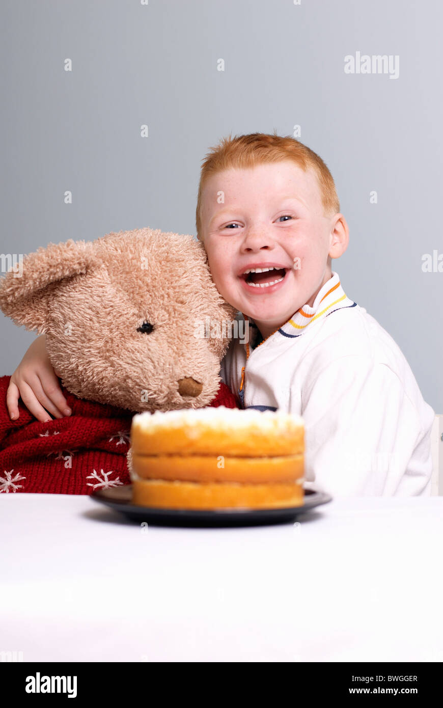 Happy children posing birthday cake hi-res stock photography and images ...
