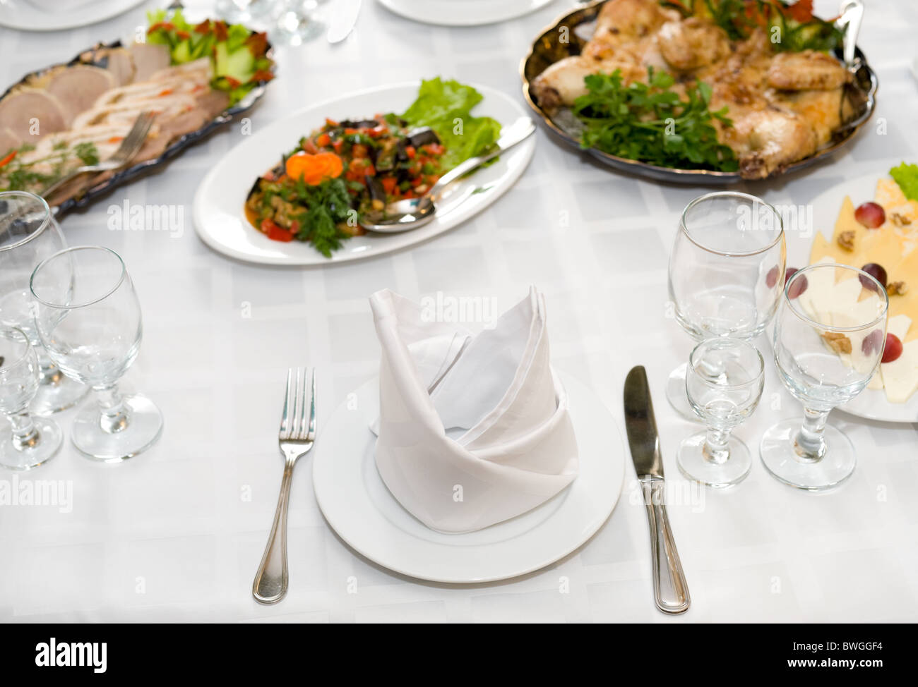 served dinner for one person at laid restaurant banquet table Stock ...