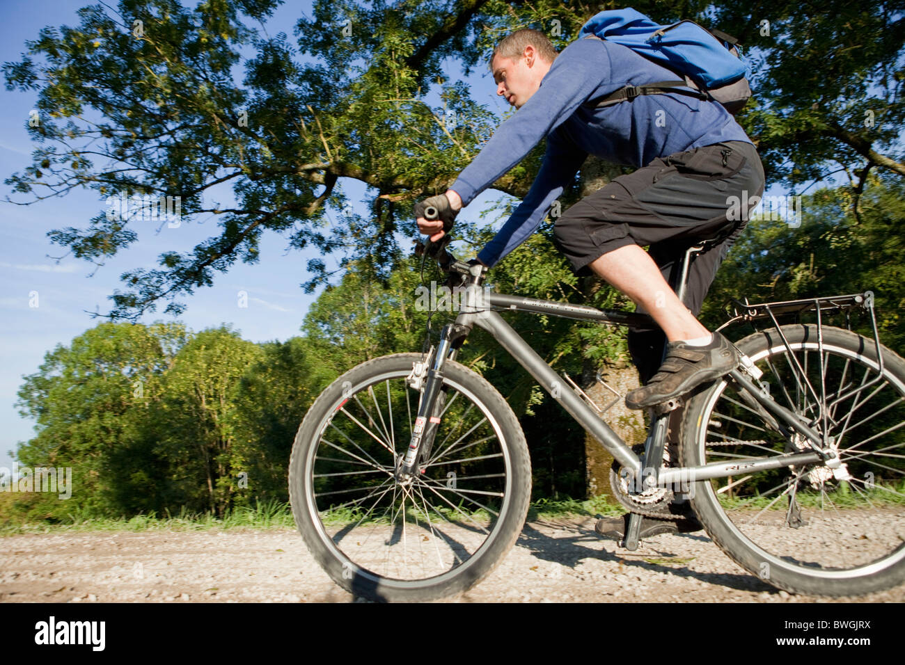 Man cycling with mountain bike Stock Photo - Alamy