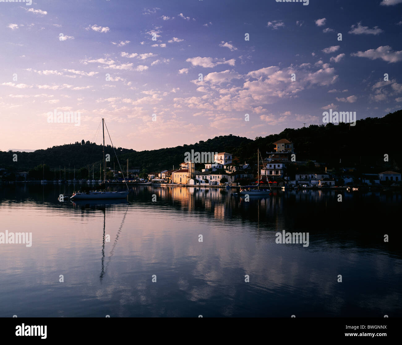Dawn at Vathi Harbour on the tiny and unspoiled Greek island of ...