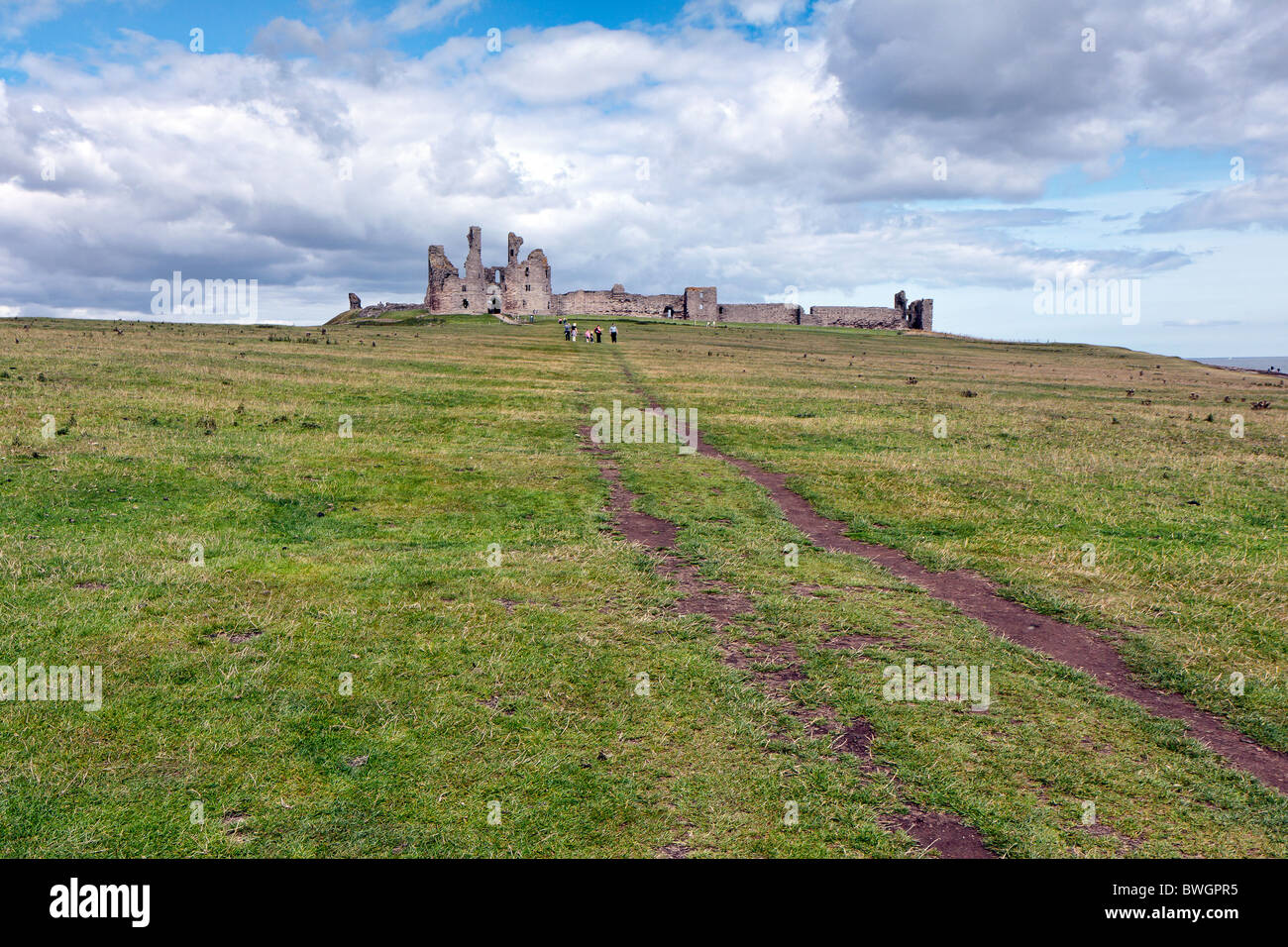 View of Dunstanburgh Castle at Craster Northumberland Stock Photo - Alamy
