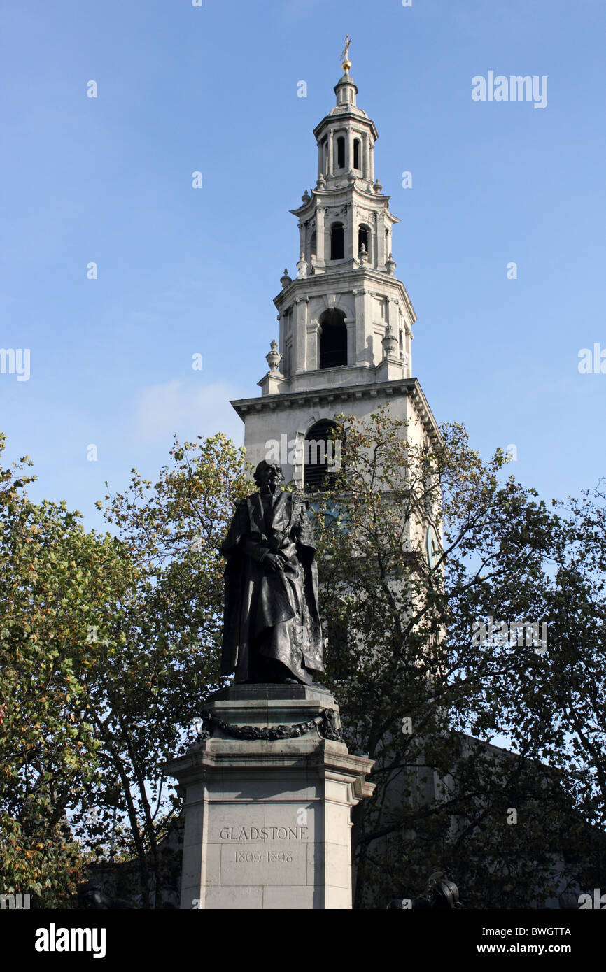 Statue of Prime Minister Gladstone outside Wren church of St Clement ...