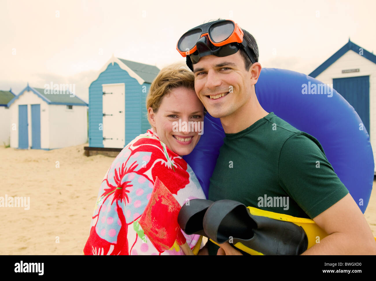 Couple wrapped in beach towel hi-res stock photography and images - Alamy