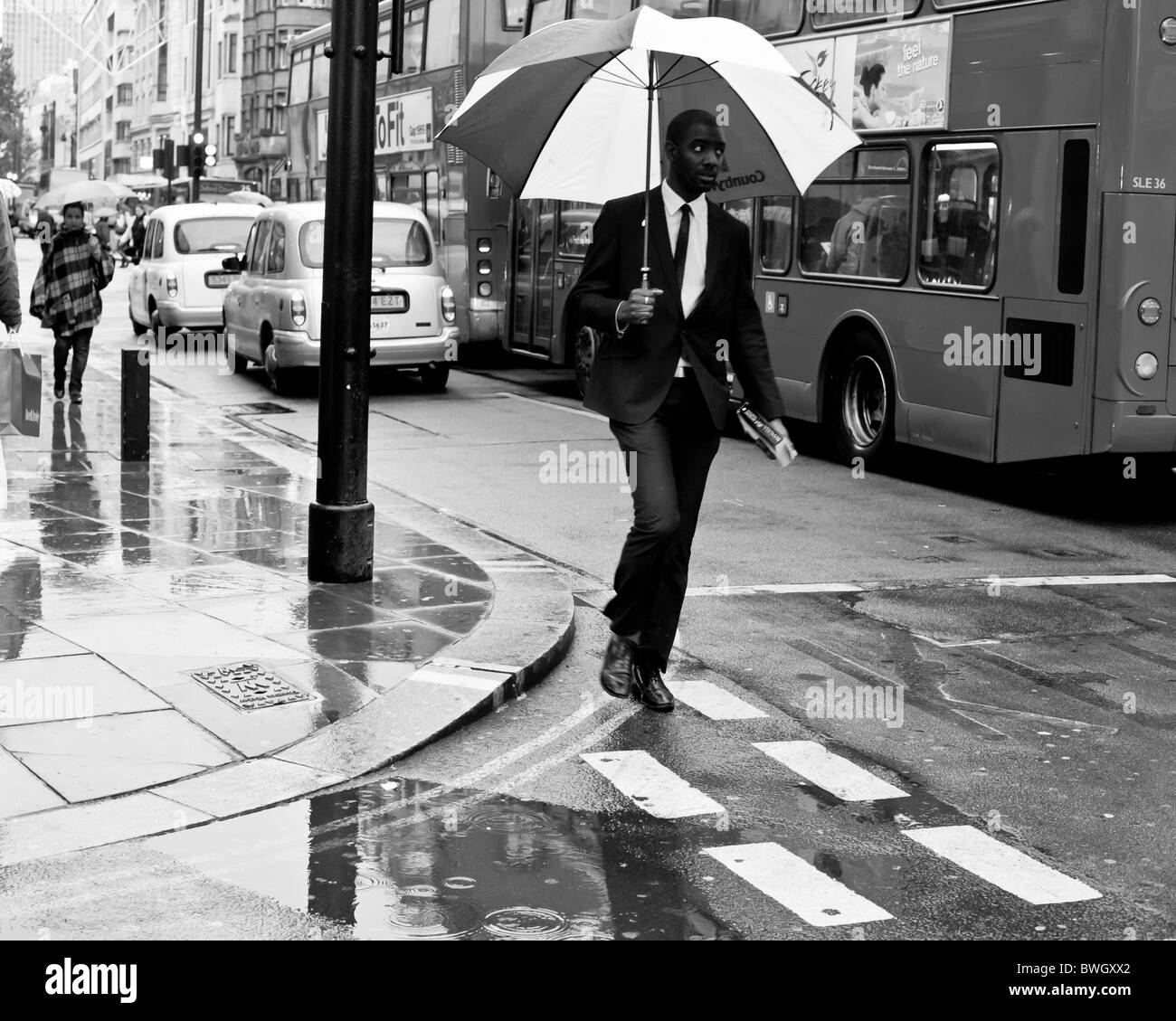 Bus at crossing Black and White Stock Photos & Images - Alamy
