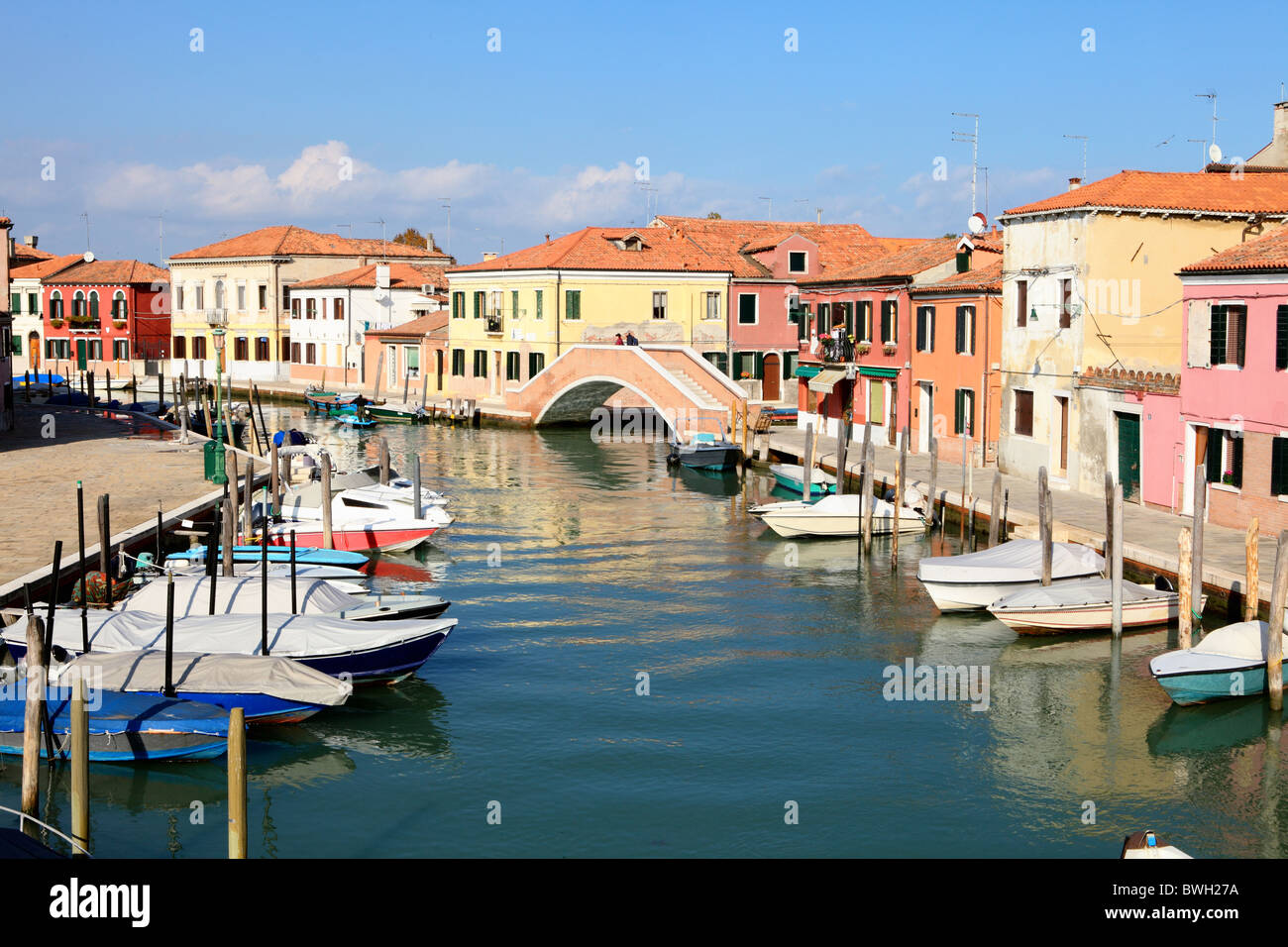 A view of one of the canals in the island of Murano, Venice, which has ...