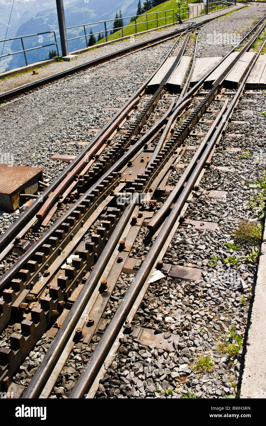 Swiss narrow gauge mountain rail track showing geared or toothed rack ...