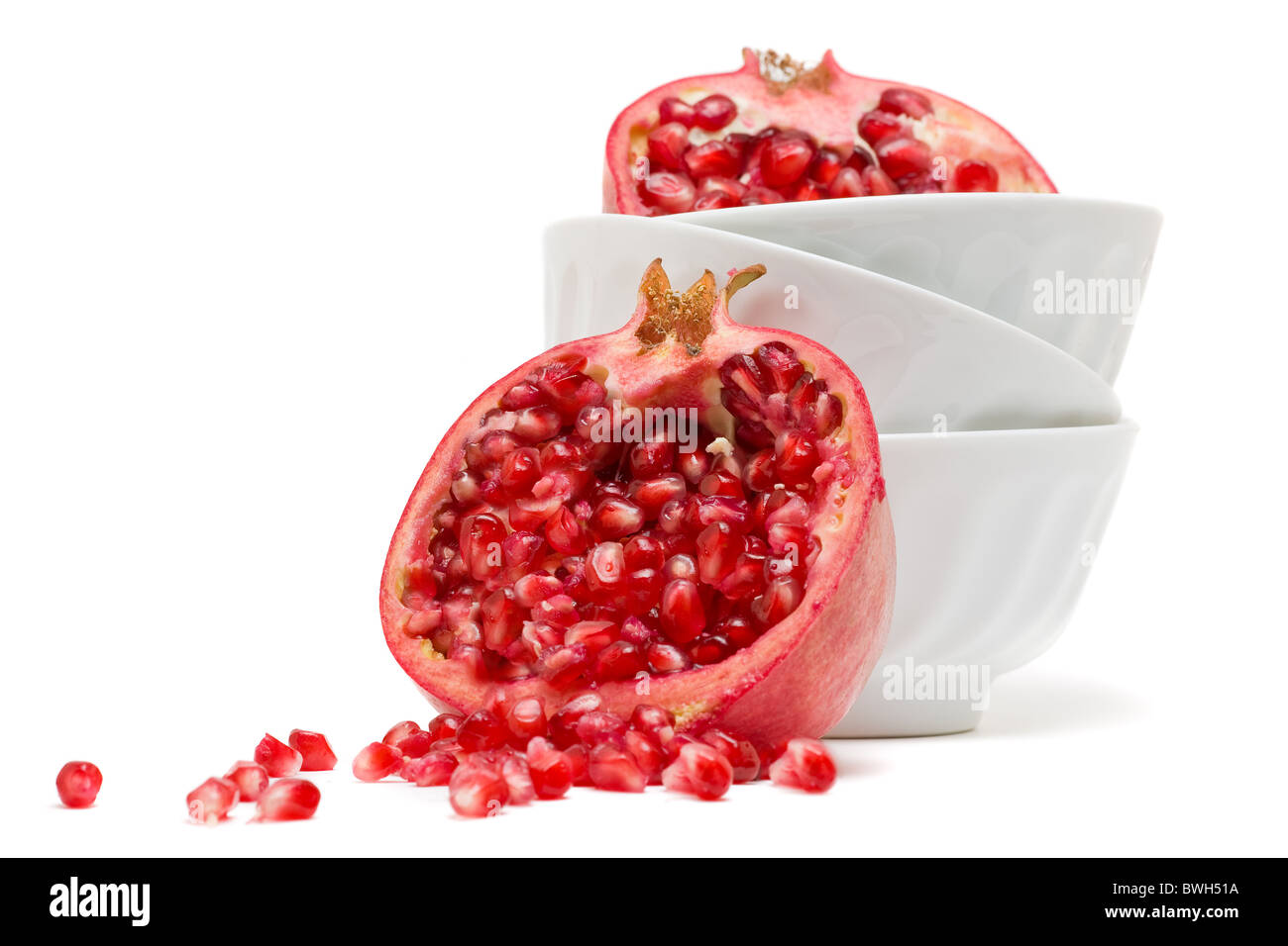 Ripe pomegranate seeds isolated Cut Out Stock Images & Pictures - Alamy