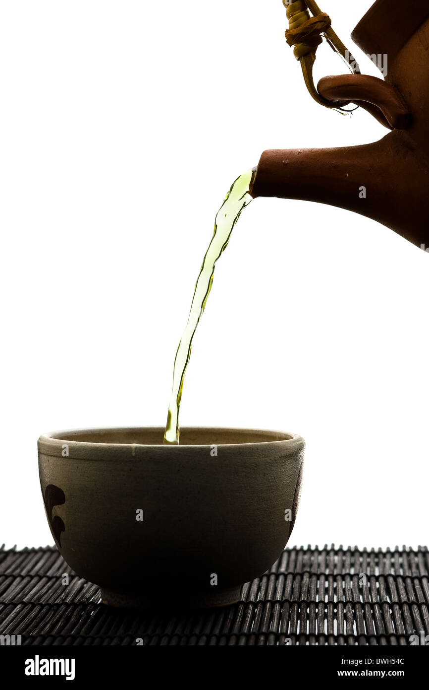 Tea being poured isolated hi-res stock photography and images - Alamy