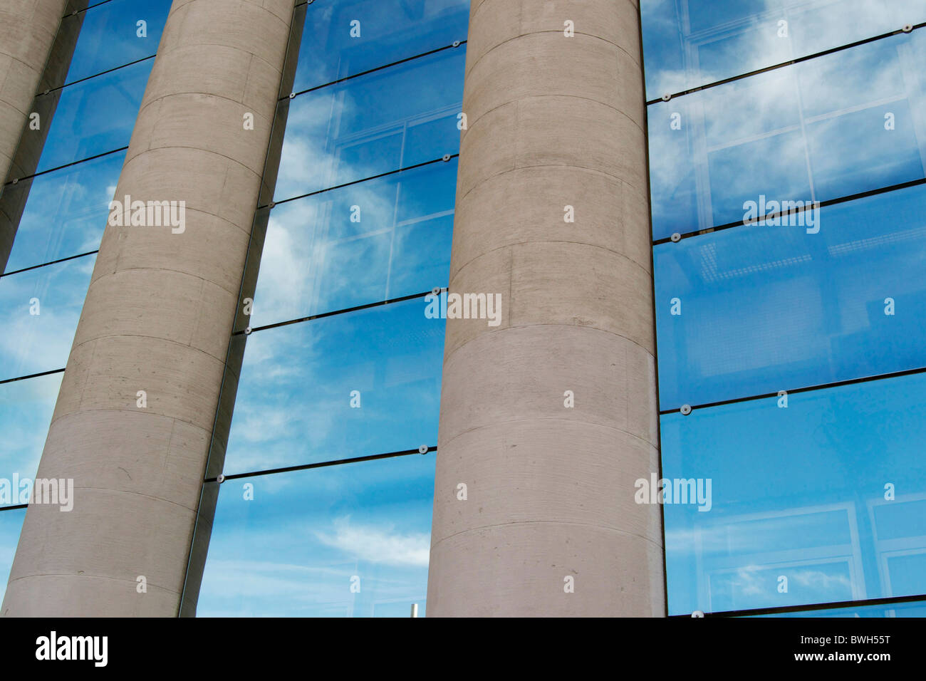Columns and windows reflecting the sky Stock Photo - Alamy