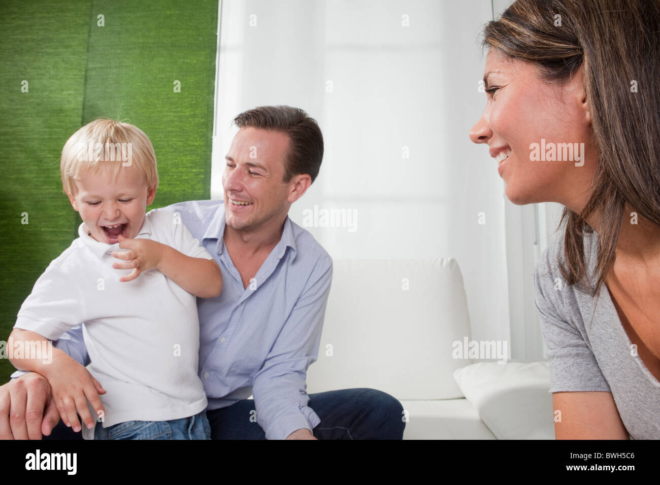 Family having fun at home Stock Photo - Alamy