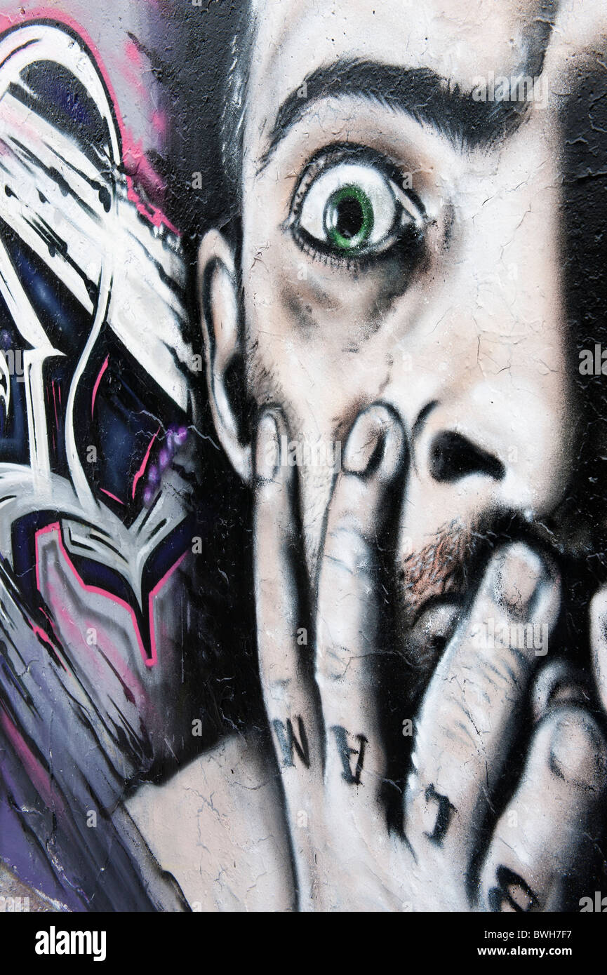 graffiti face on wall Stock Photo - Alamy