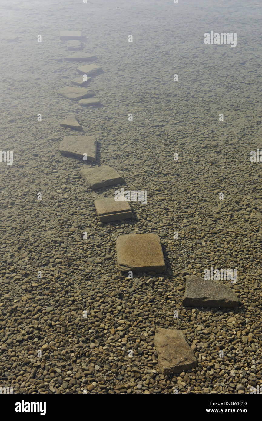Stone way in water Stock Photo - Alamy