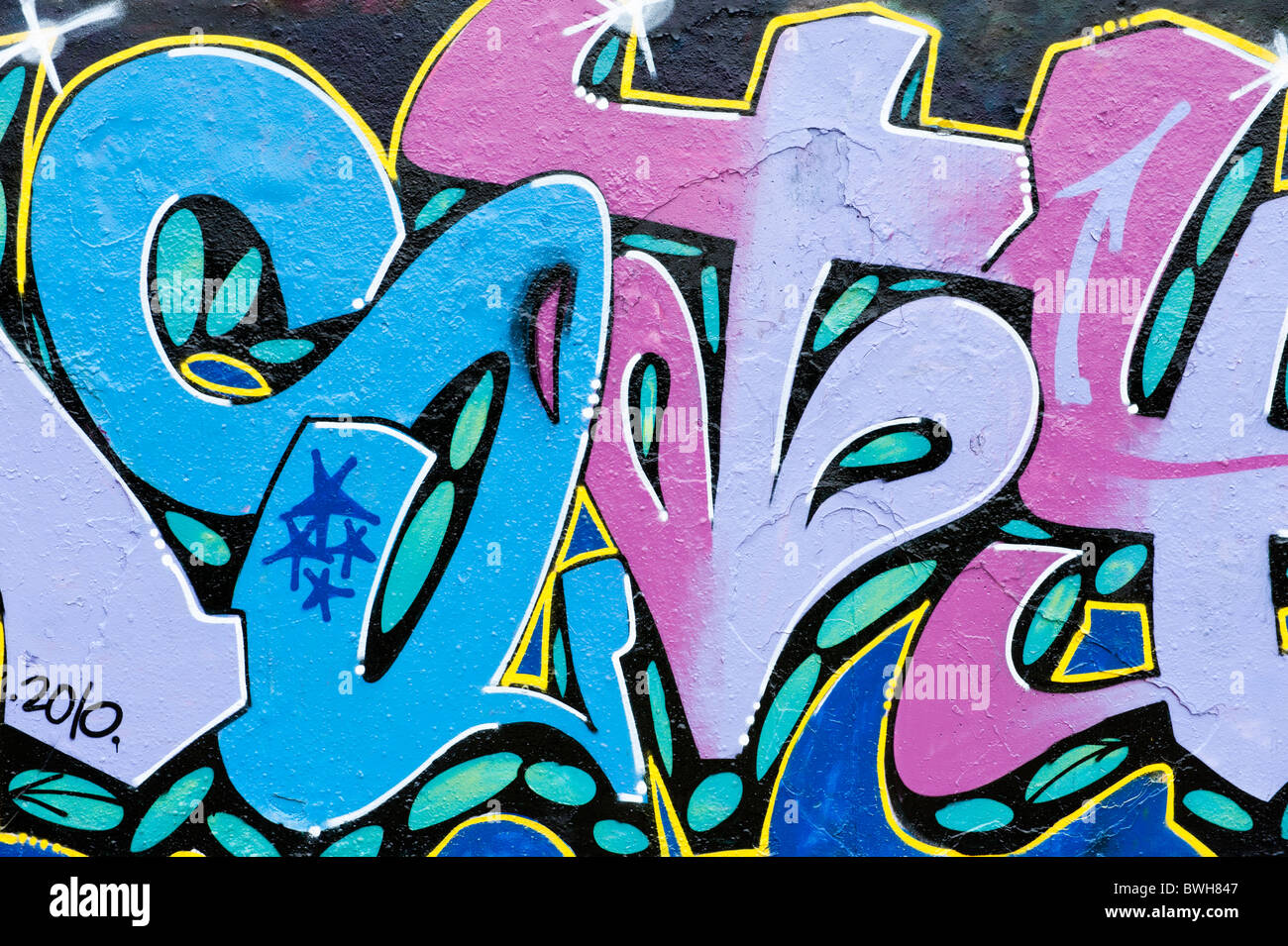 graffiti blue and purple on wall Stock Photo - Alamy