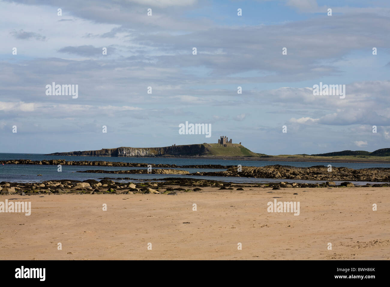 Dunstanburgh Castle from the sandy beach at Embleton Bay Embleton ...