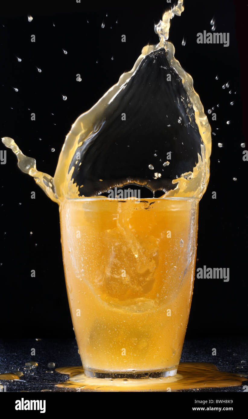Mango juice splash hi-res stock photography and images - Alamy