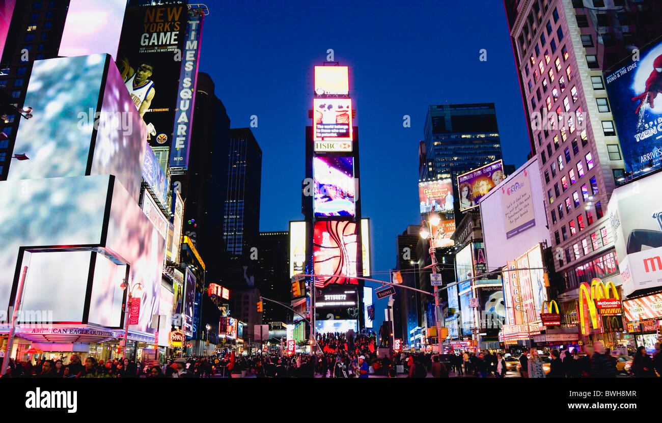 New york times square ads vacationers hi-res stock photography and ...