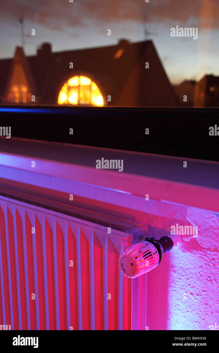 Illuminated radiator, thermostat, central heating in a private house ...