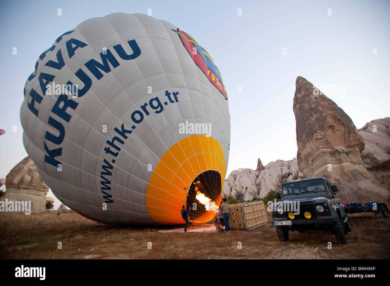 Hot air balloon being inflated at dawn, Goreme National park ...