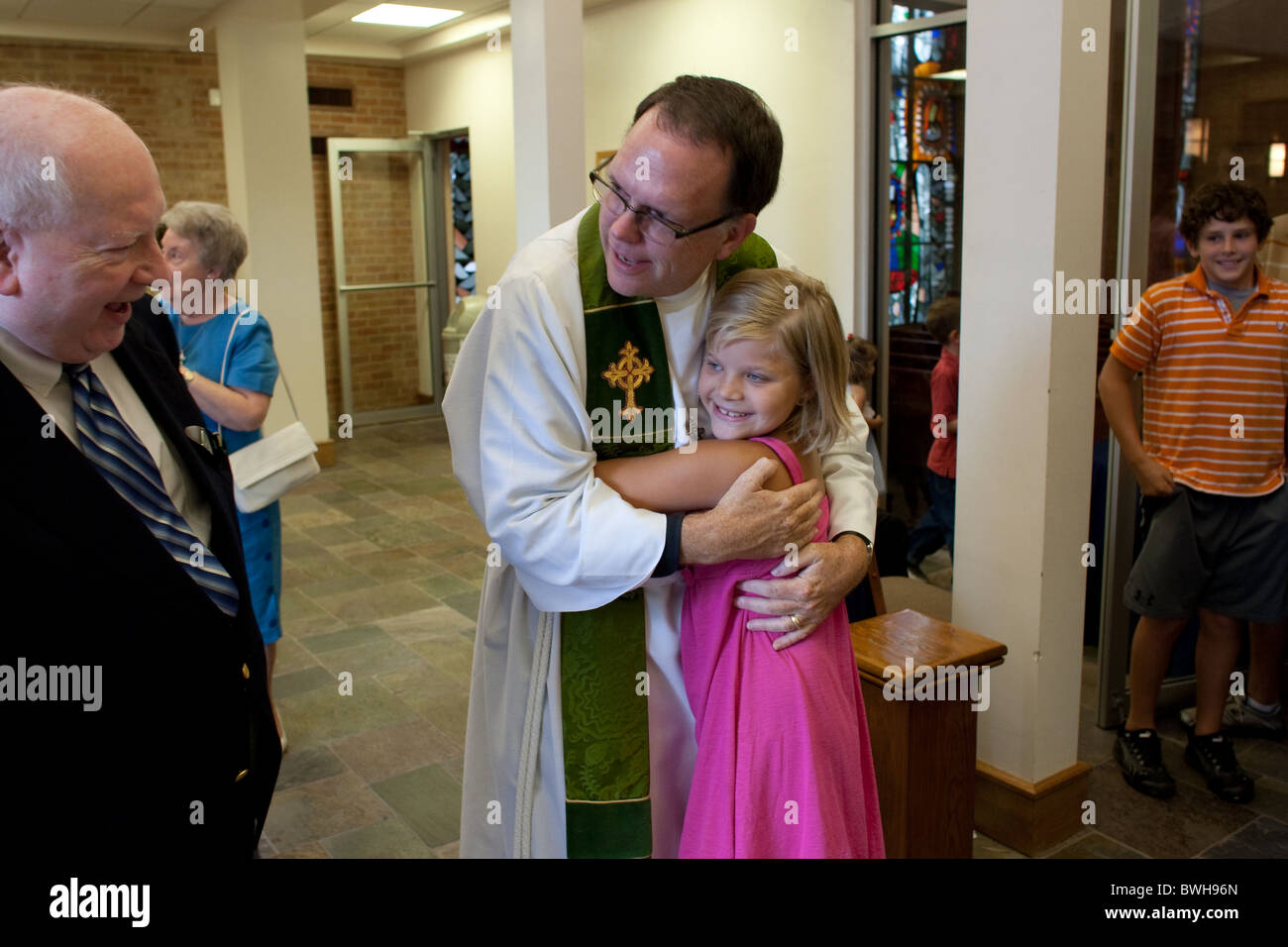 Hugs after church hi-res stock photography and images - Alamy