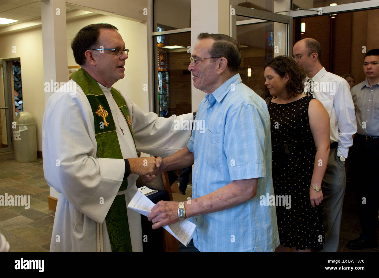 People Greeting Each Other In Church