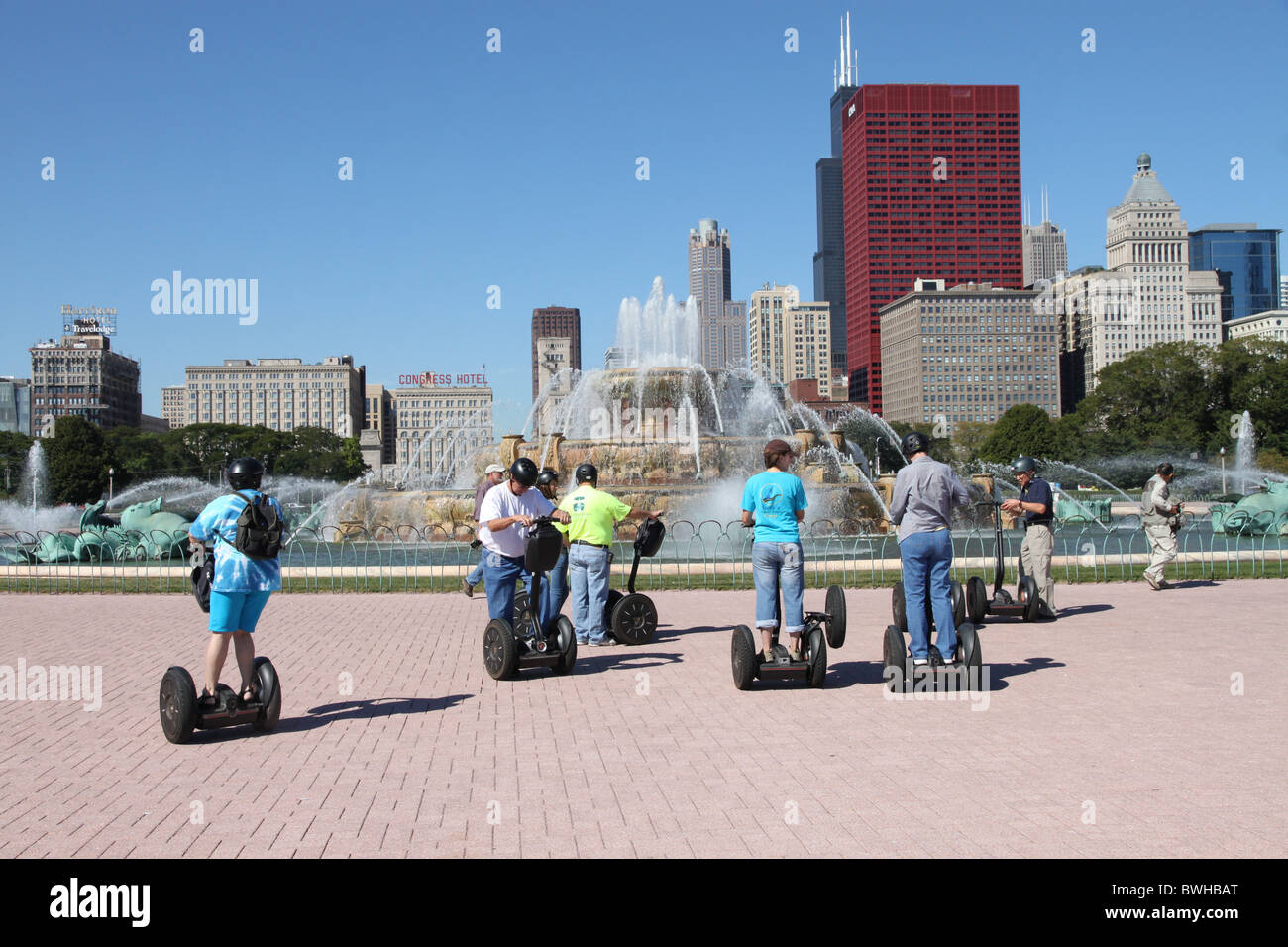 Chicago Skyline with Buckingham Fountain and Segway Scooters Stock ...