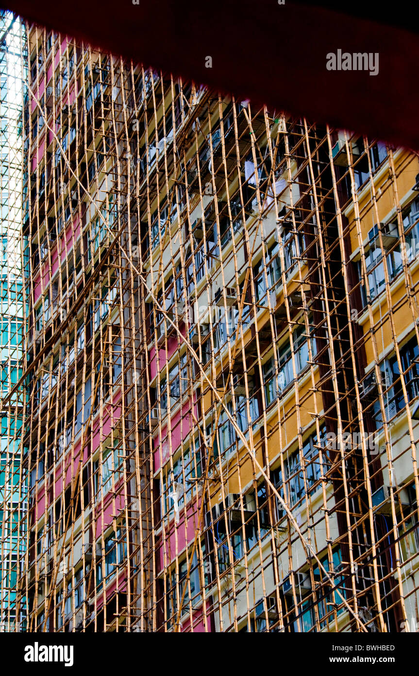 Bamboo scaffolding on tall office building in downtown Hong Kong China Stock Photo - Alamy