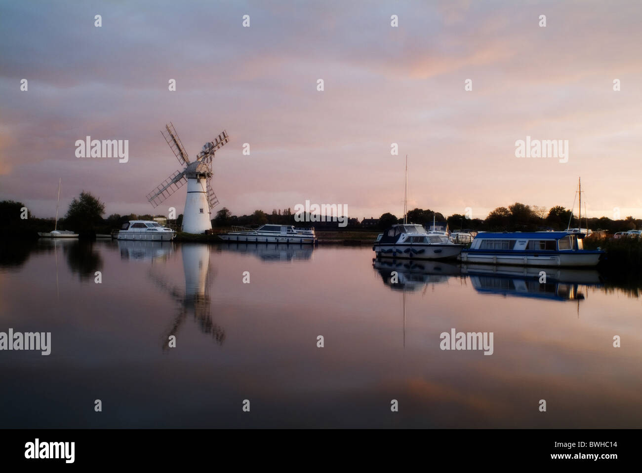 A photograph of Thurne windmill in the Norfolk Broads taken a dawn ...