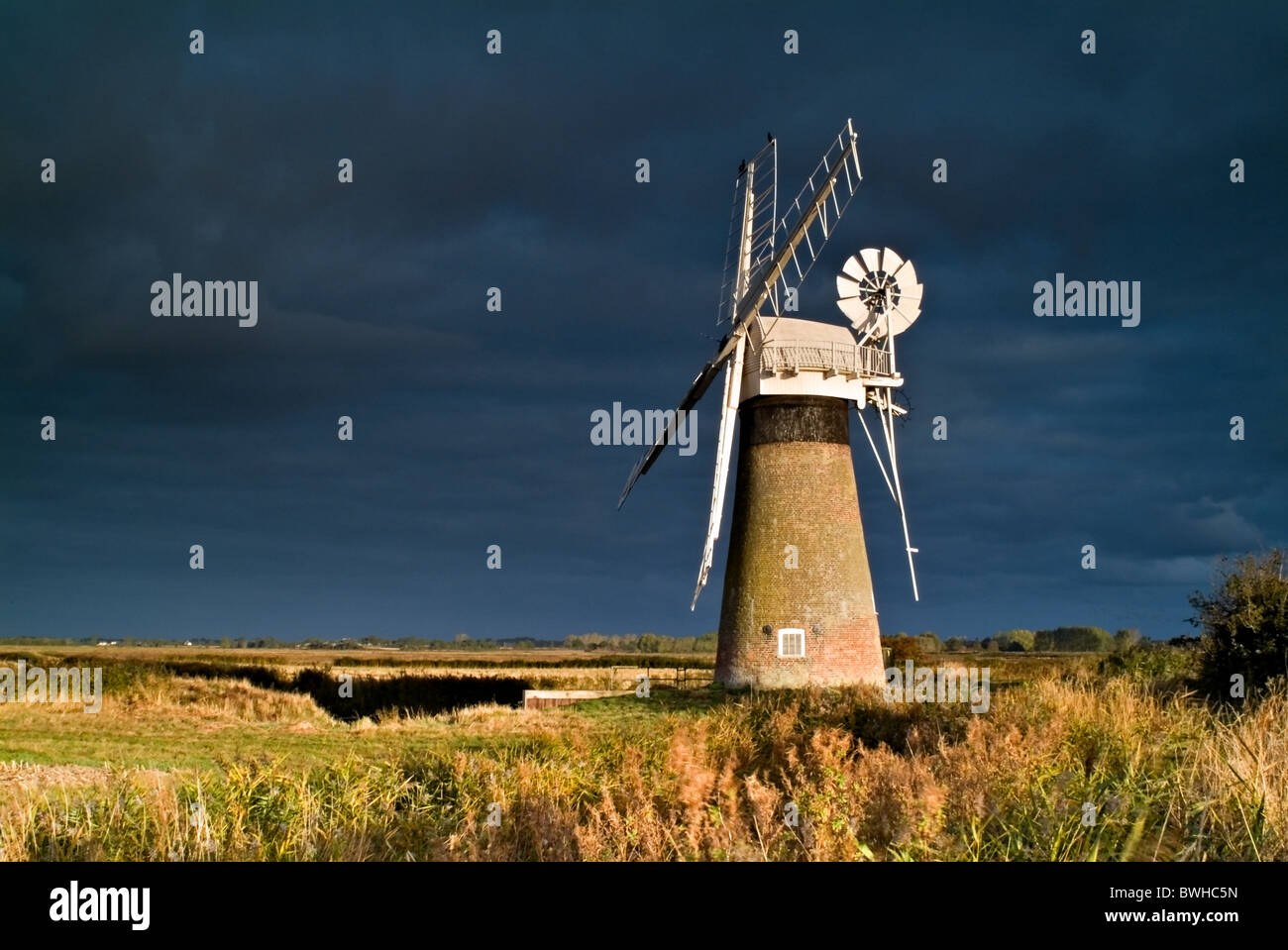 A windmill in the Norfolk Broads taken a dawn Stock Photo - Alamy