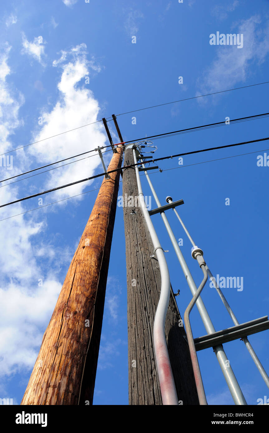 Electrical Power Pole against Blue Sky Stock Photo - Alamy