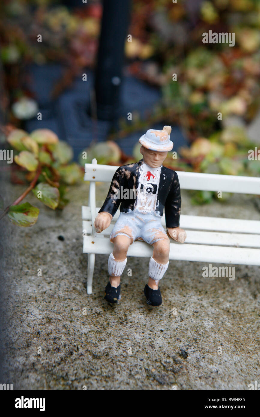 Man sitting on bench Stock Photo - Alamy