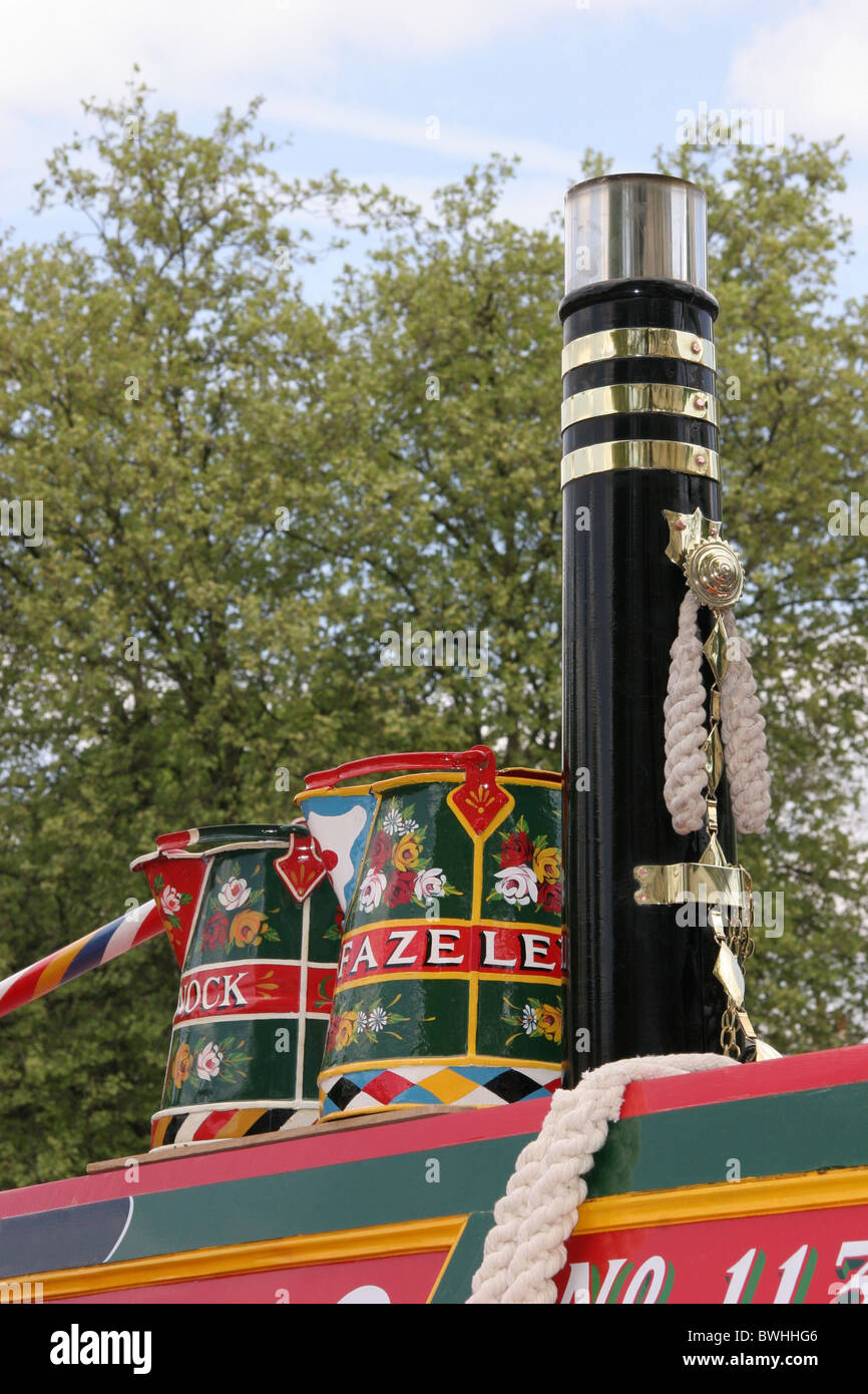 two decorated buckby cans traditionaly painted with castles and roses ...