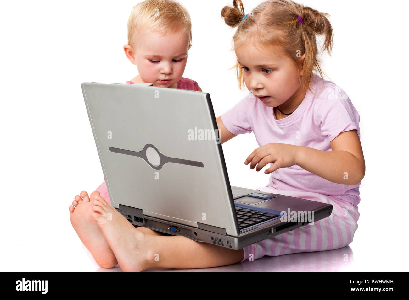 Children playing on laptop isolated on white Stock Photo - Alamy