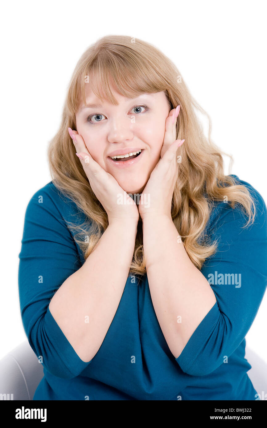 The young woman is pleased and surprised simultaneously Stock Photo - Alamy