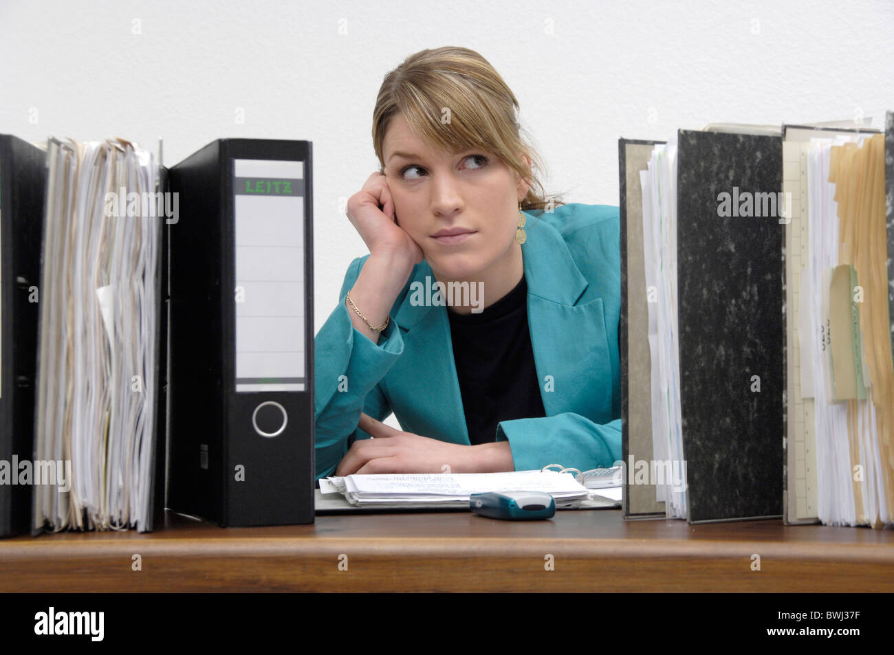 woman office employees boredom Boring bored thinking folder file table ...