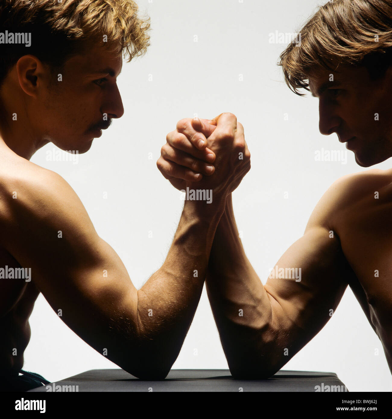 Two men arm wrestling hi-res stock photography and images - Alamy