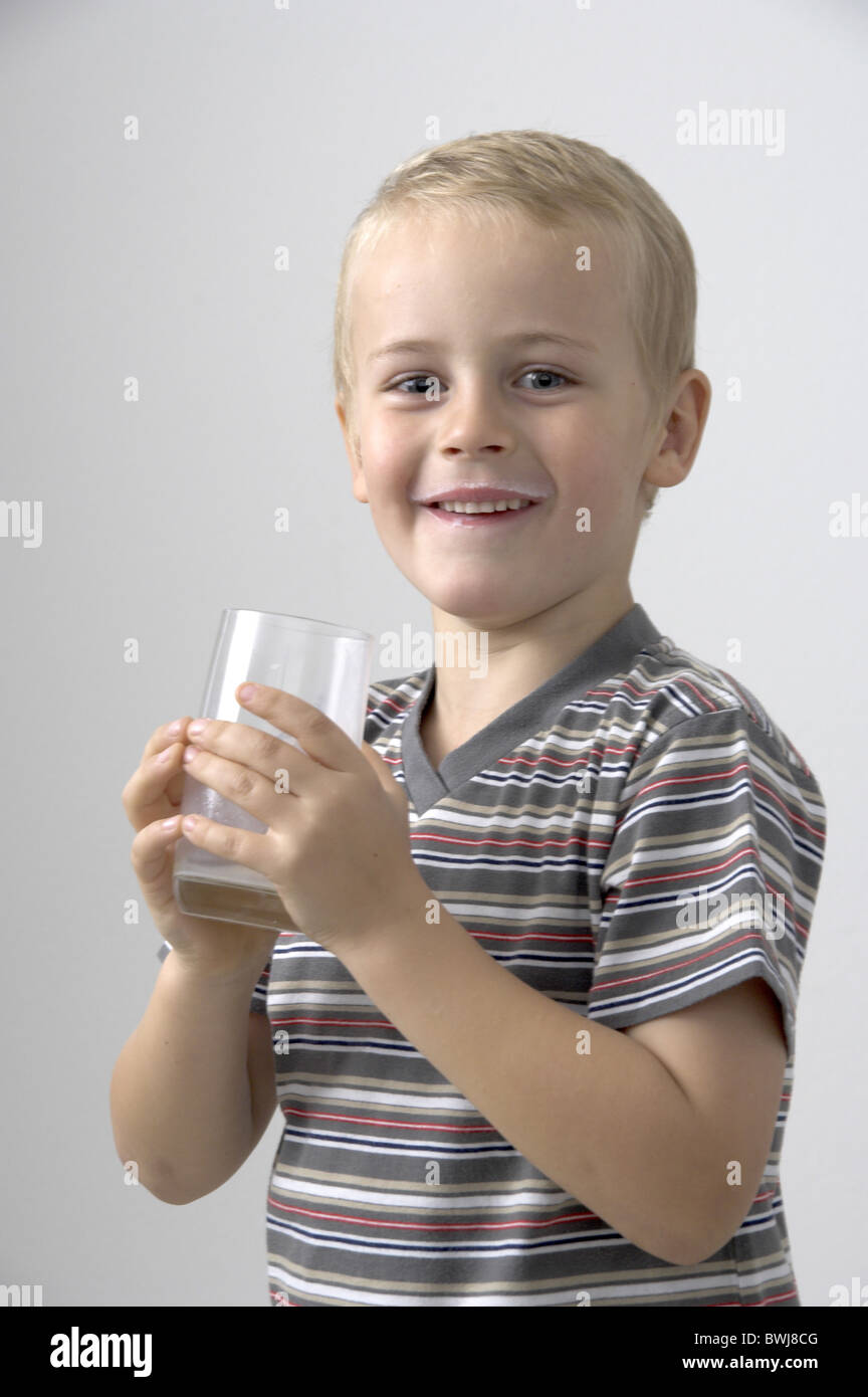 child boy drinking milk glass food drinks portrait studio Stock Photo ...