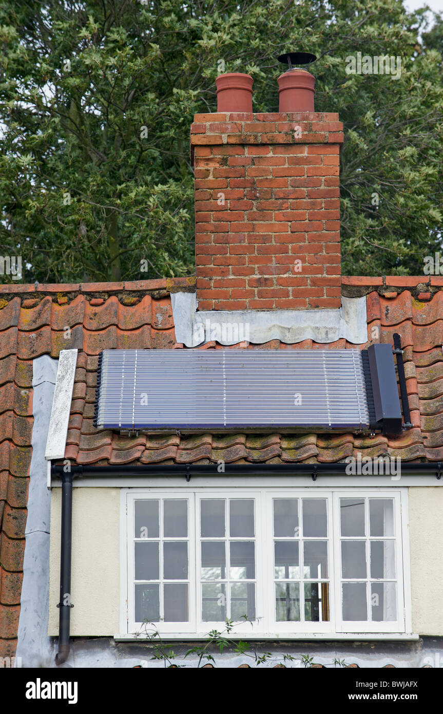 Evacuated solar energy tubes fitted to the roof of a residential ...