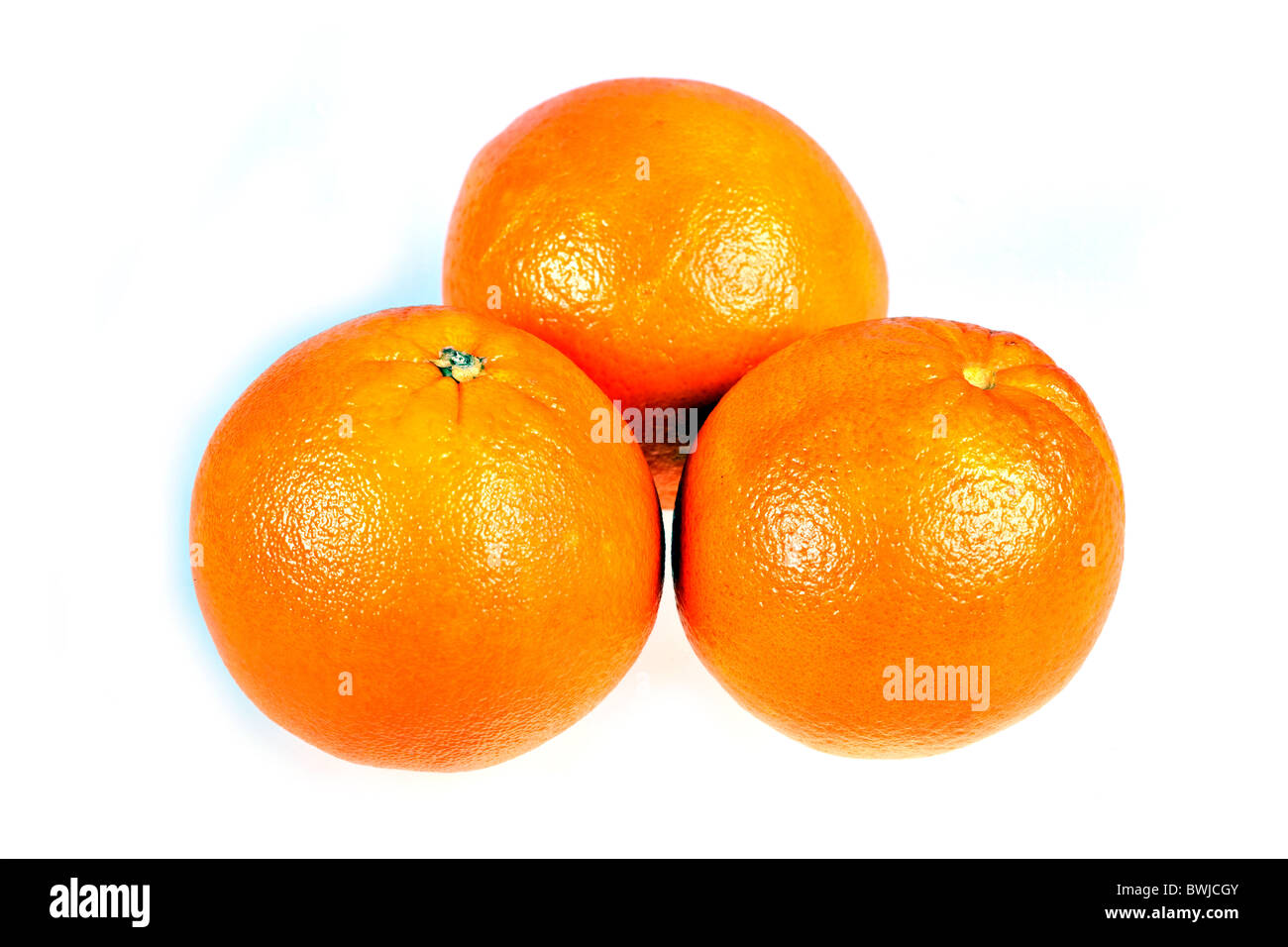 three juice oranges isolated on white background Stock Photo - Alamy