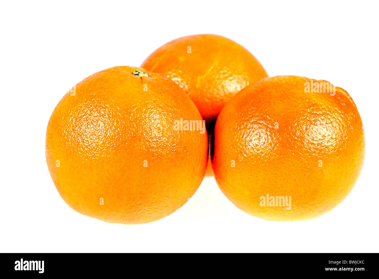 three juice oranges isolated on white background Stock Photo - Alamy
